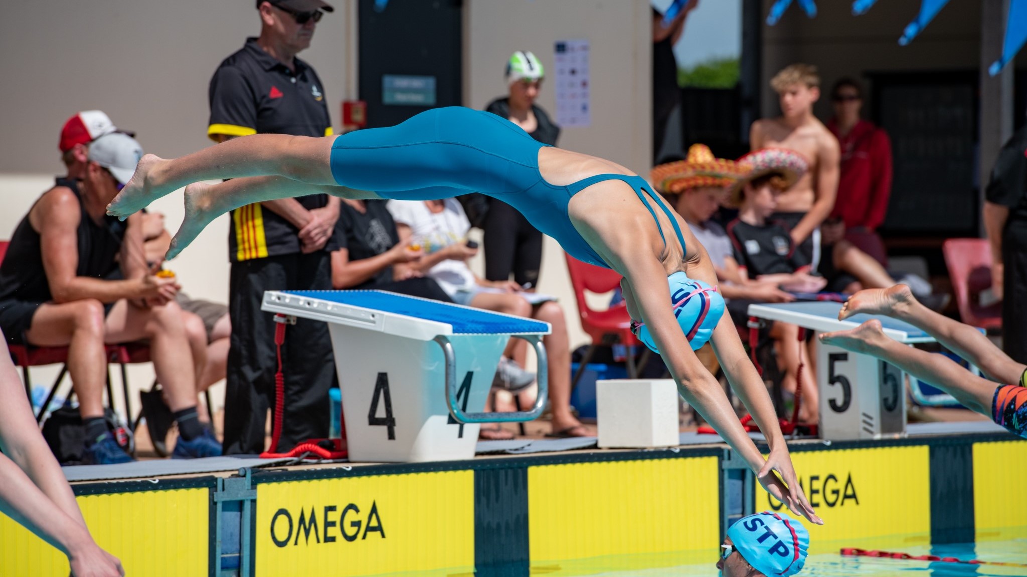 Competitive Swimming from Learn to Swim to Winning Races