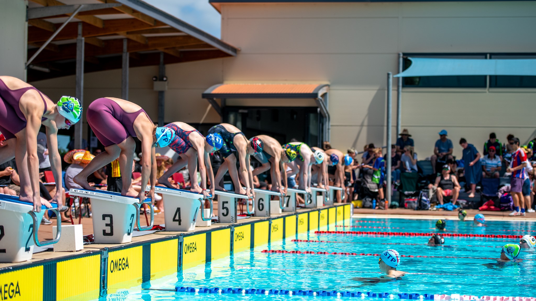 Competitive Swimming from Learn to Swim to Winning Races